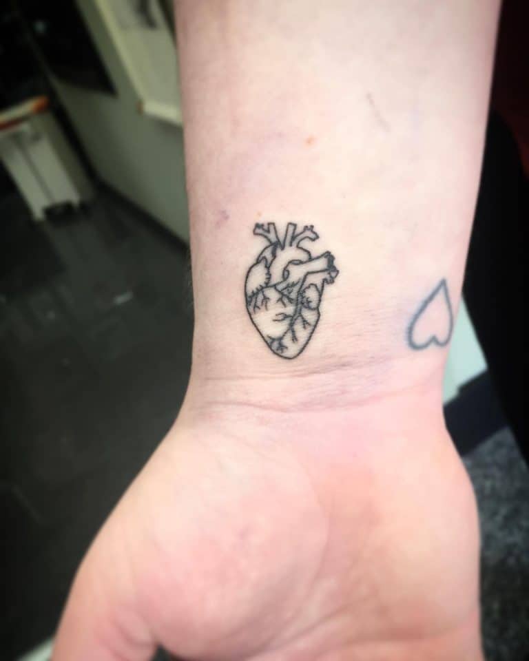 Minimalist Heart Outline Tattoo Ideas for a Subtle Look
